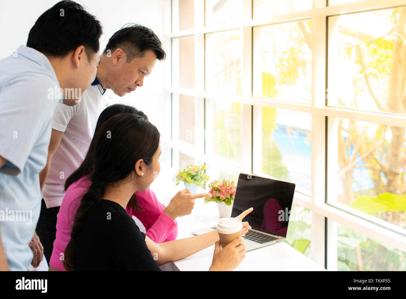 group of Freelance working cafe Stock Photo - Alamy