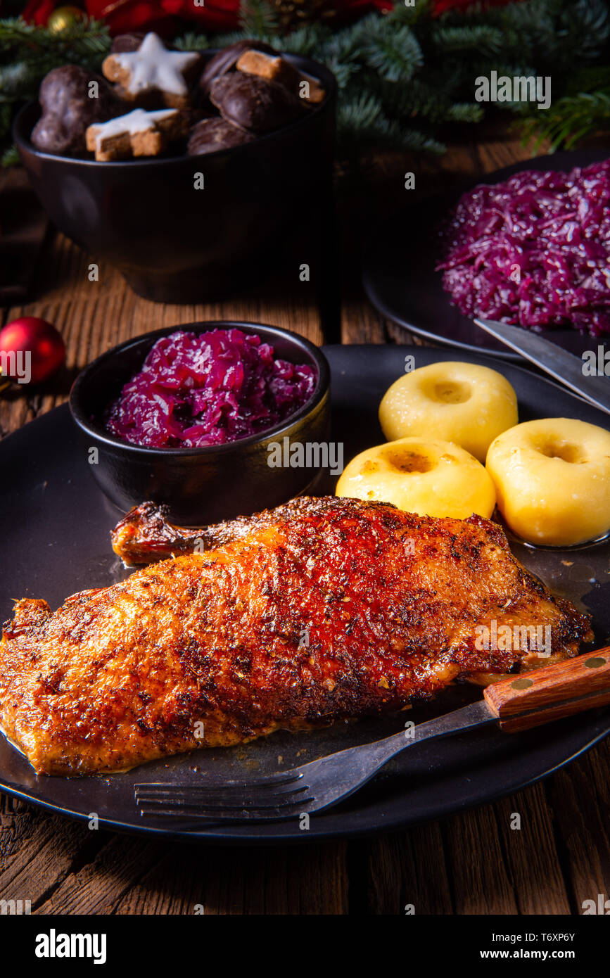 classic and crispy roasted duck with cabbage and dumplings Stock Photo ...