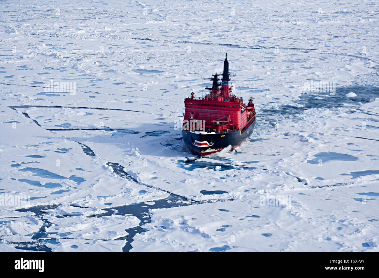 Aerial view of Russian nuclear icebreaker Yamal breaking through sea ...