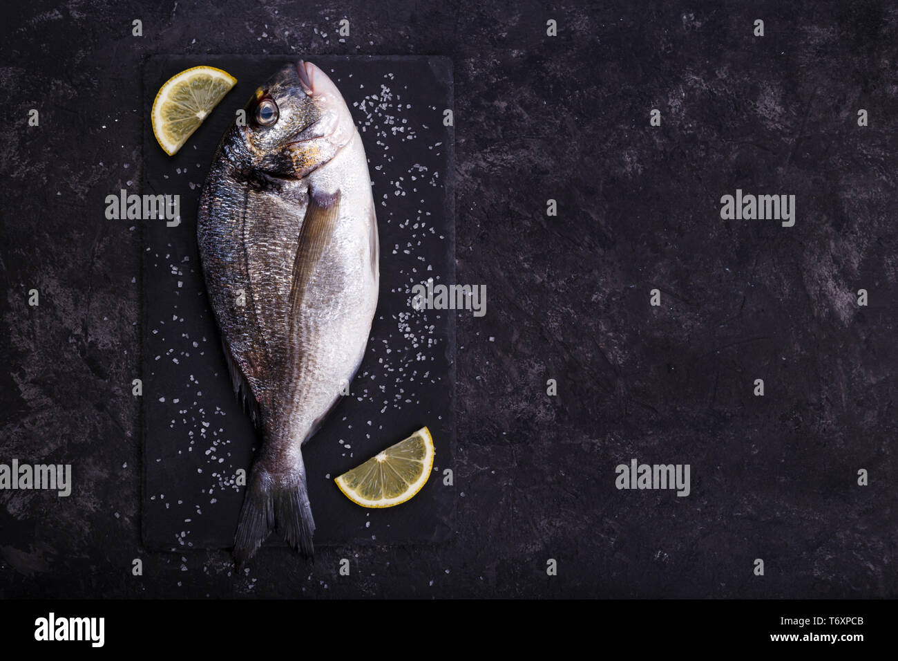 Raw sea bream fish Stock Photo - Alamy
