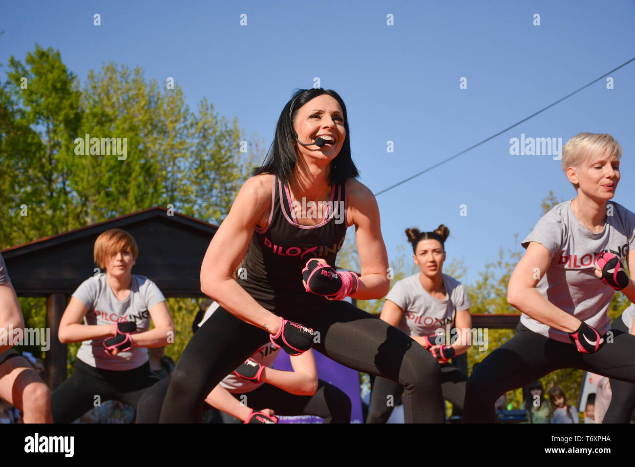 Nis, Serbia - April 20, 2019 Female group practicing pose under control ...