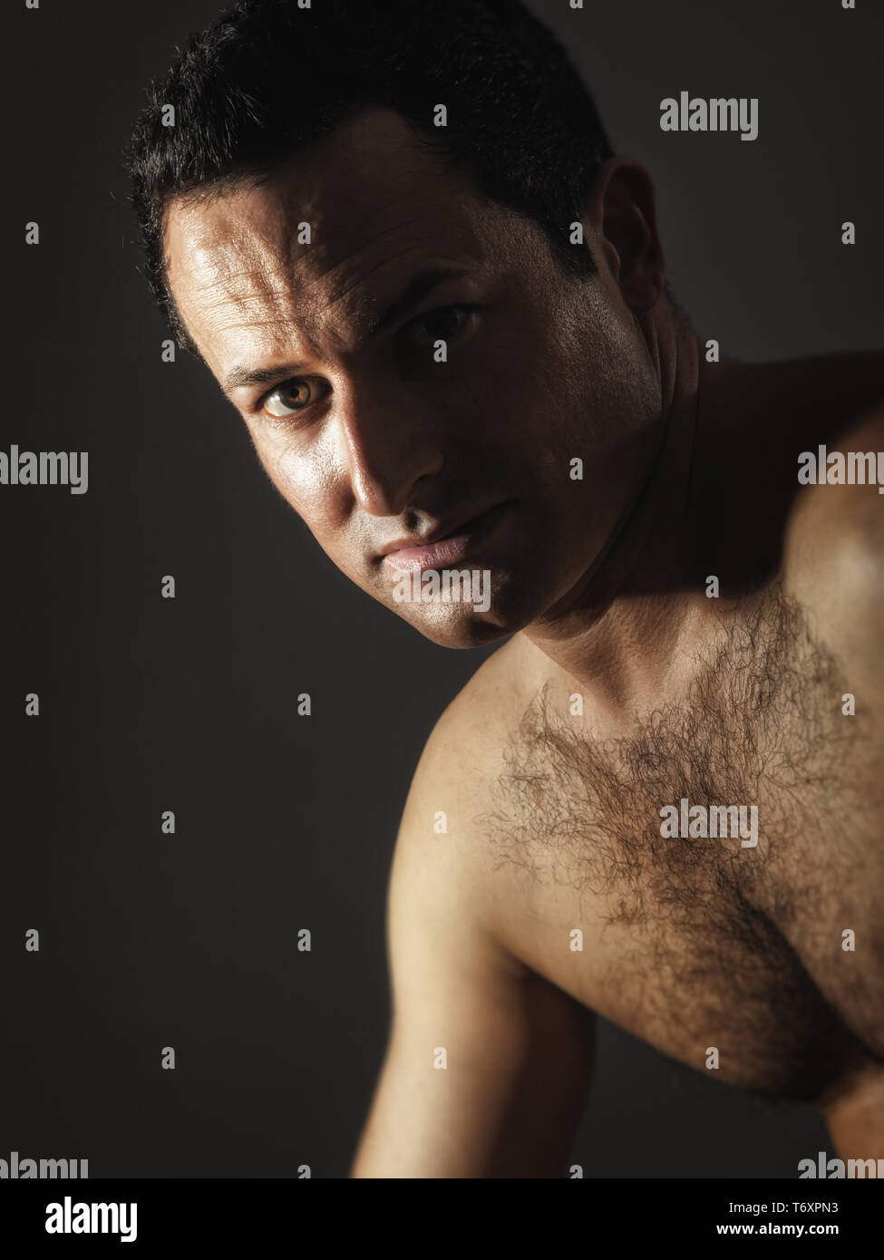 male portrait with hairy chest Stock Photo - Alamy