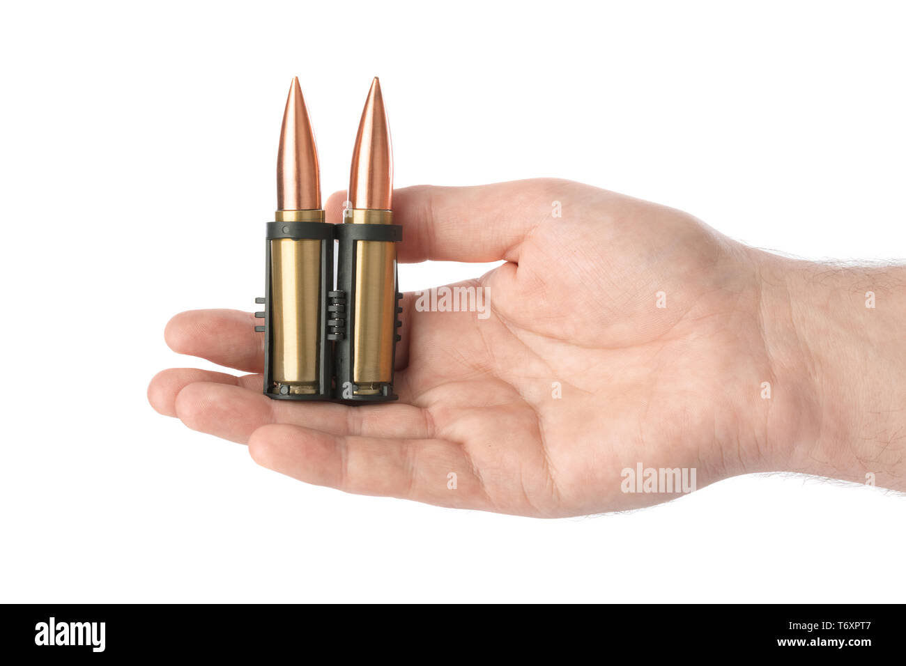 Hand with bullets Stock Photo - Alamy