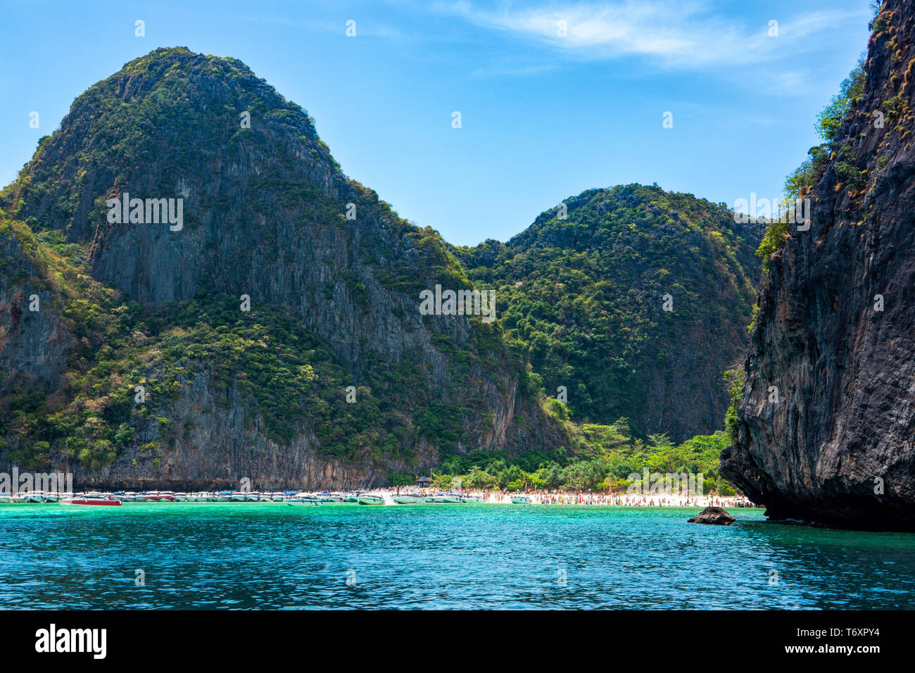Crowds of tourists enjoying a trip to Maya Bay, one of the iconic ...