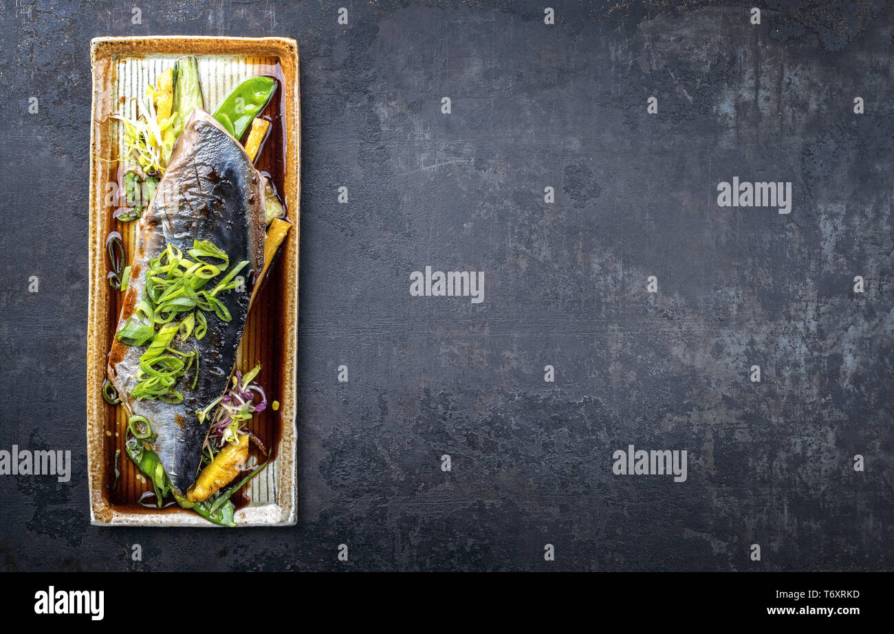 Modern style Japanese bonito tuna fish filet with vegetable and ...