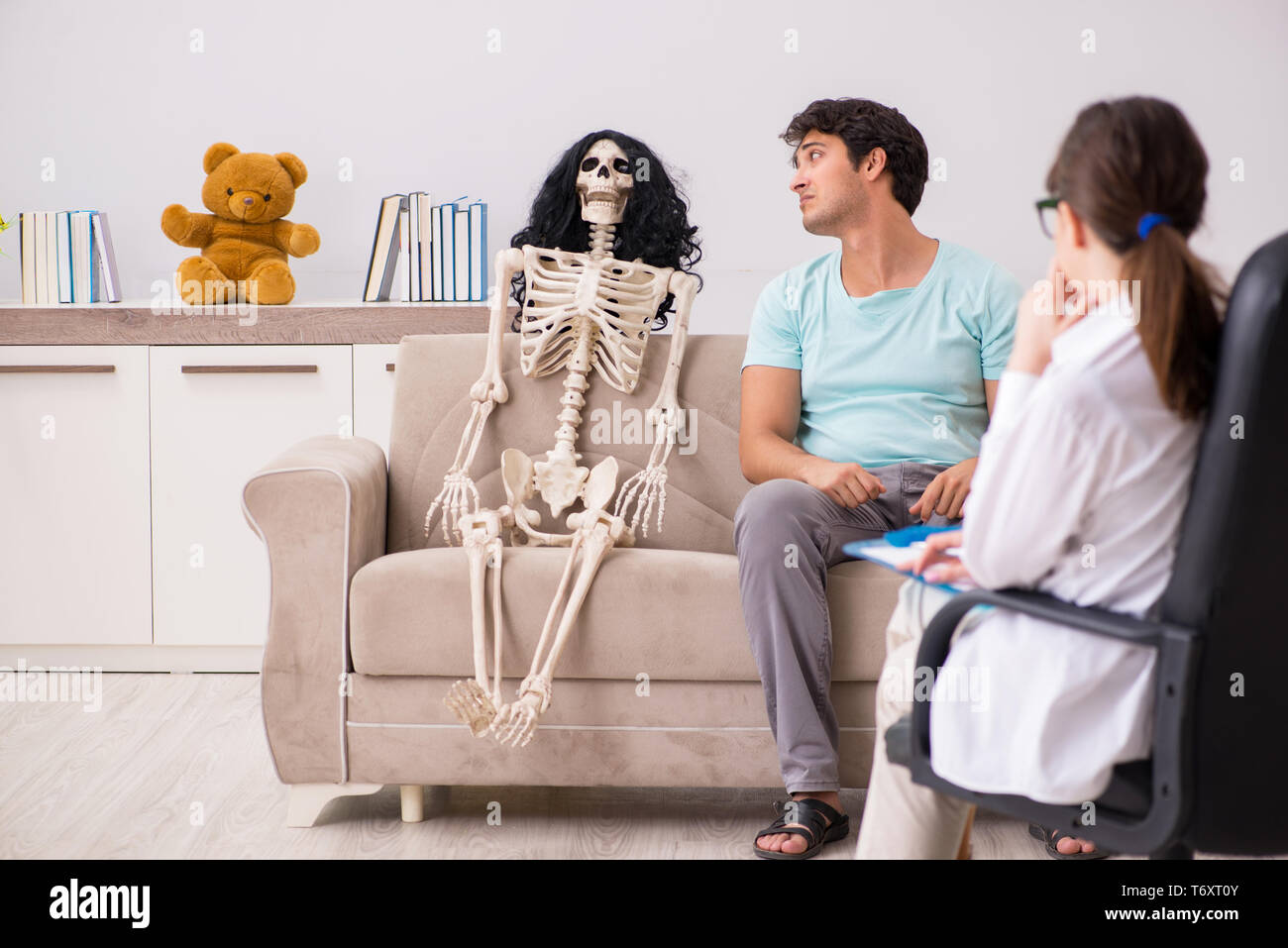 Young patient visiting psychologist for therapy Stock Photo - Alamy