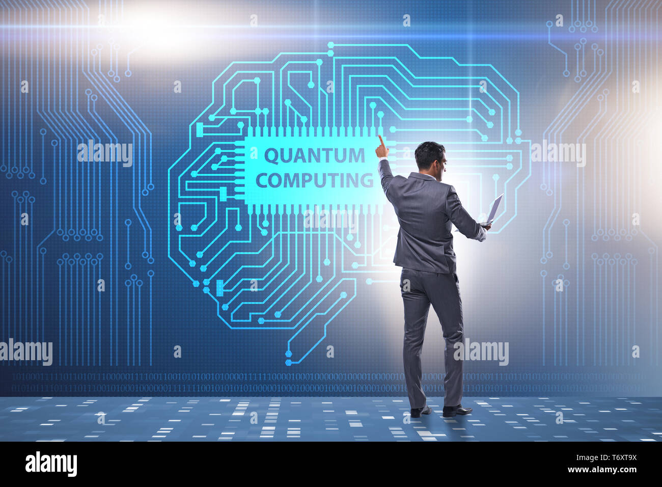 Businessman pressing virtual button in quantum computing concept Stock Photo - Alamy