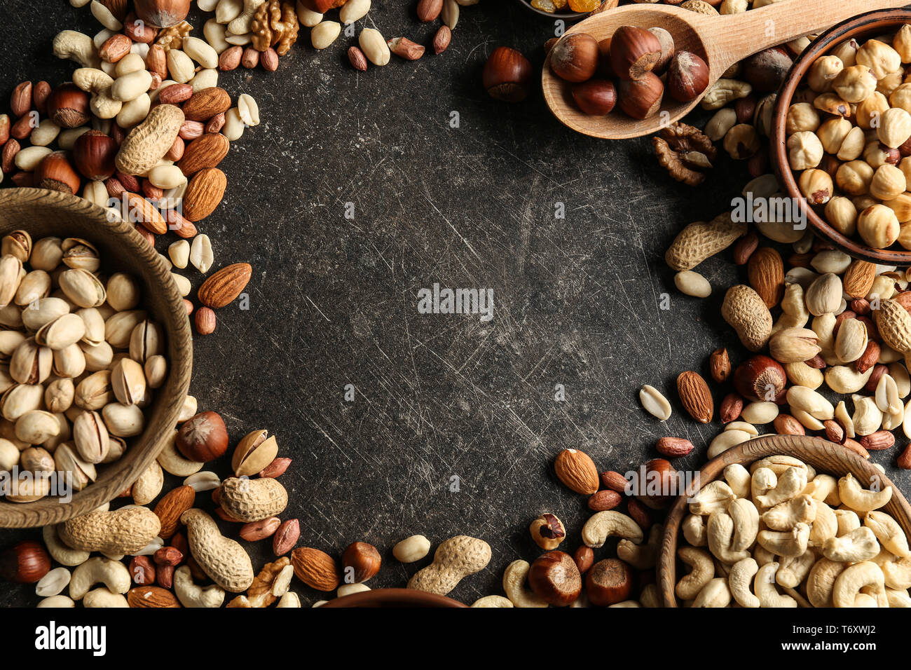 Frame made of different nuts on grey background Stock Photo - Alamy