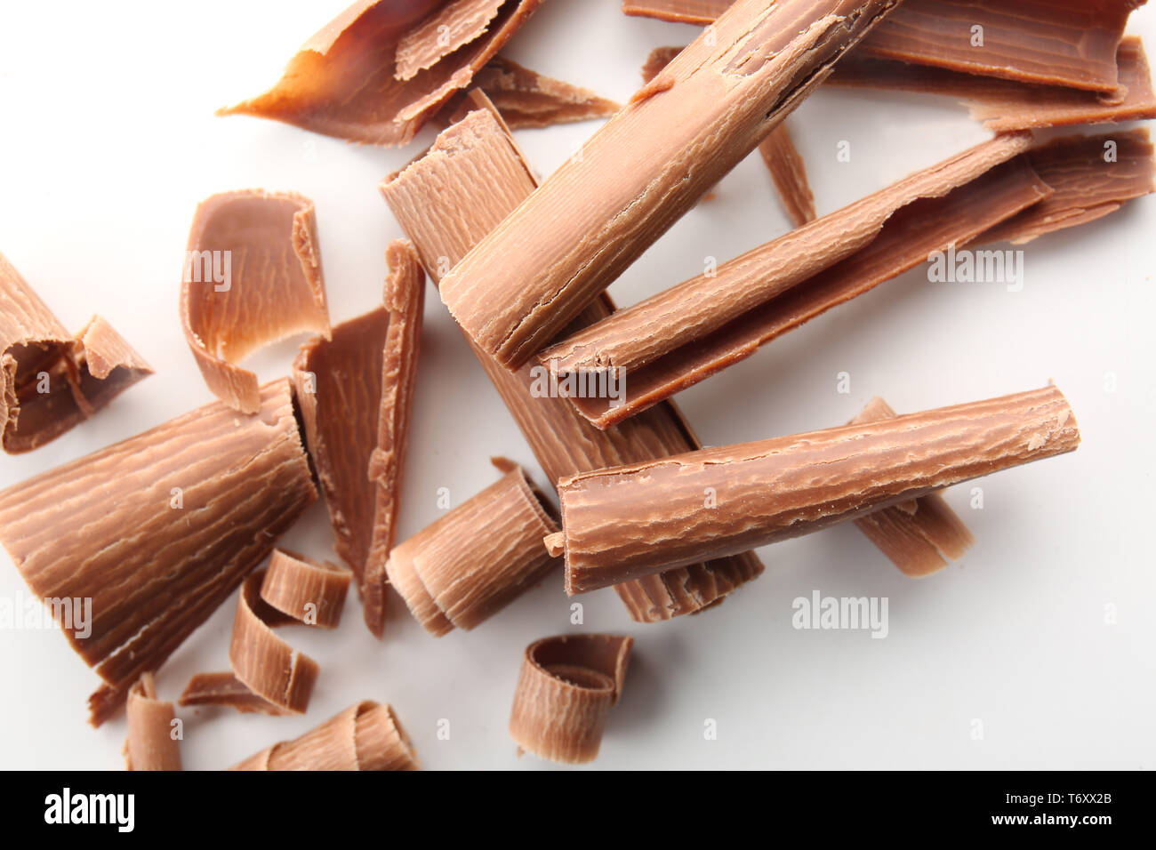 Chocolate curls, isolated on white Stock Photo - Alamy