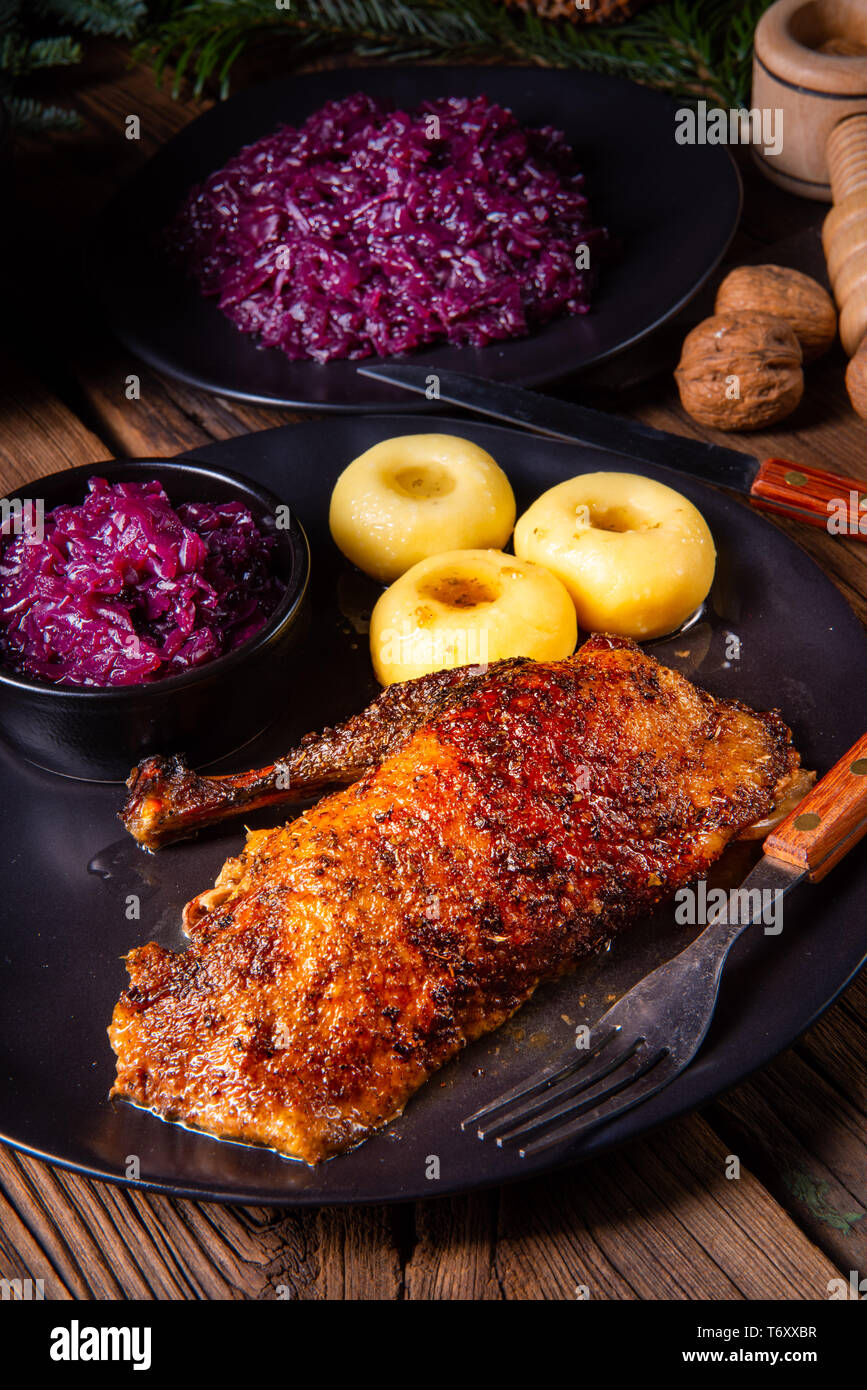 classic and crispy roasted duck with cabbage and dumplings Stock Photo ...