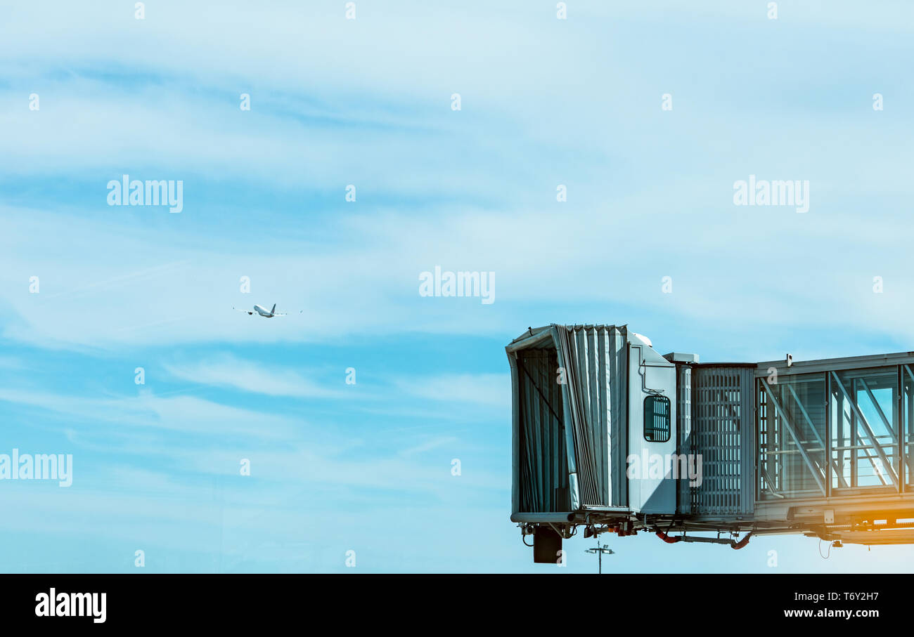 Jet bridge after commercial airline take off at the airport and the ...