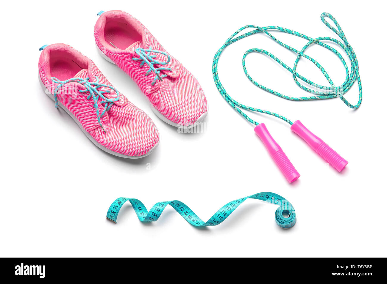 Jump rope, sneakers and measuring tape on white background Stock Photo ...