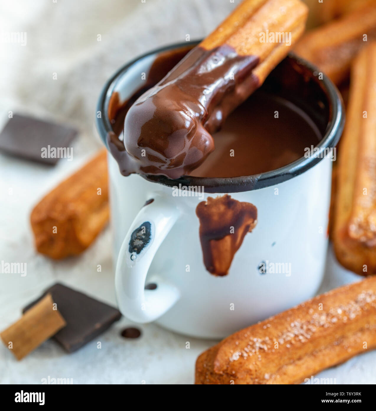 Churros cinnamon chocolate sauce hi-res stock photography and images ...