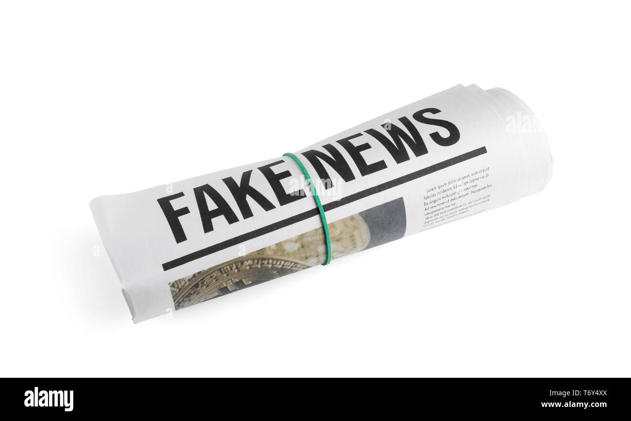 Rolled newspaper with headline FAKE NEWS on white background Stock ...
