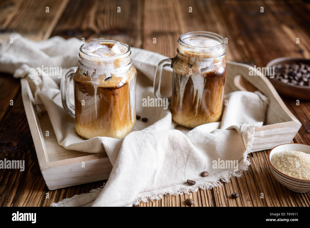 Delicious cold drink – iced coffee with ice and cream Stock Photo - Alamy