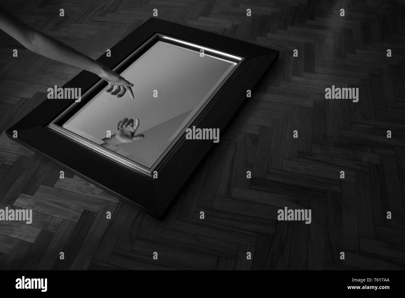 hand pointing reflecting in a mirror Stock Photo - Alamy