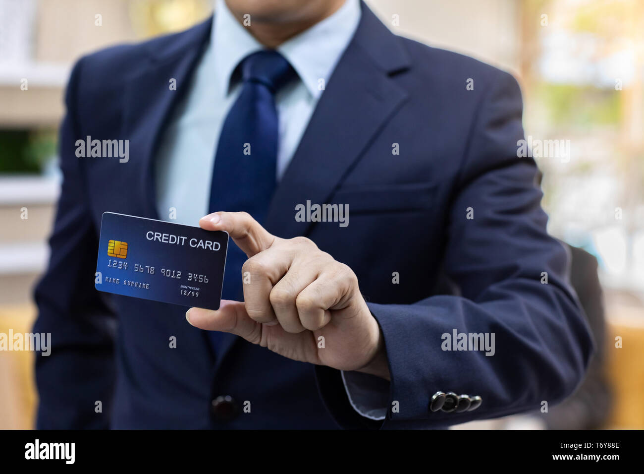 Hold credit card hi-res stock photography and images - Alamy