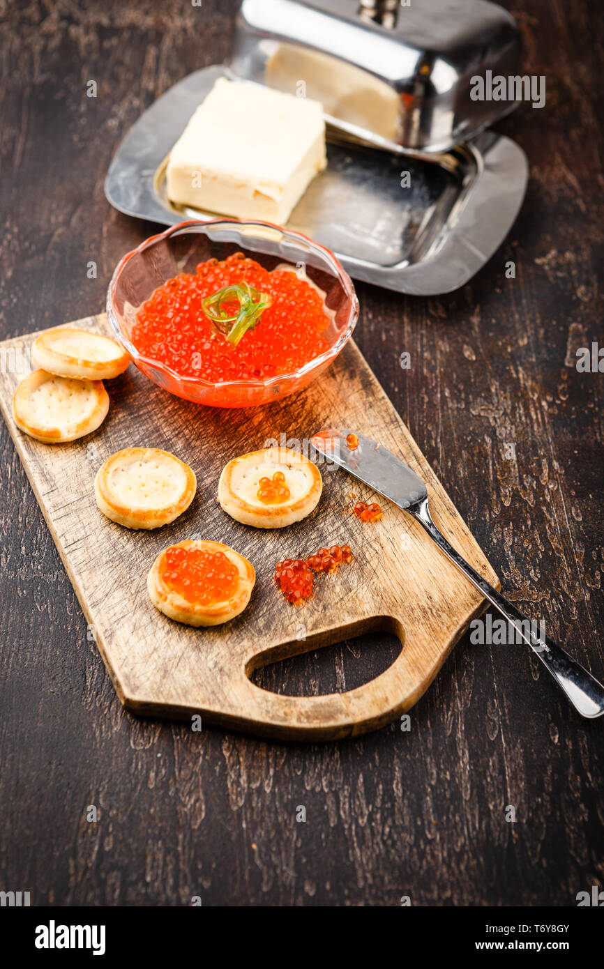 Canape with red salmon caviar Stock Photo - Alamy