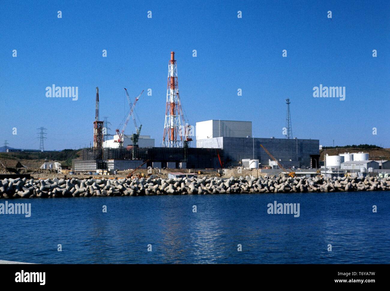 Wide shot of the Fukushima Daiichi Nuclear Power Plant, under ...
