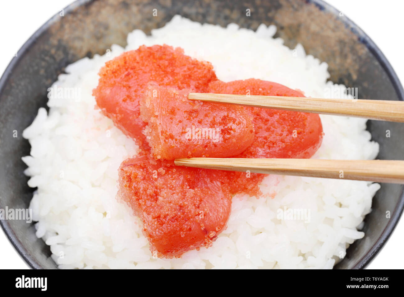 Japanese cooked white rice with karashi mentaiko on white background ...