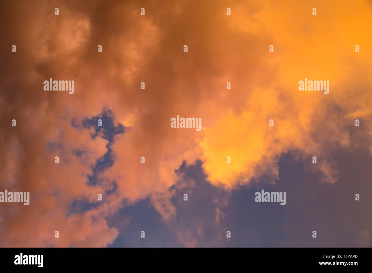 Dramatic clouds at colourful moody sunset Stock Photo - Alamy