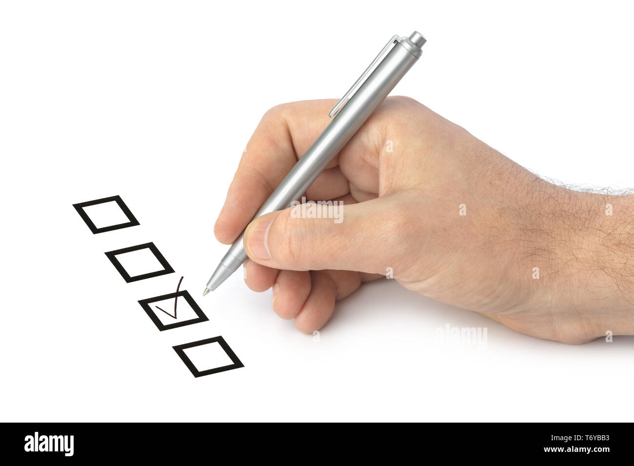 Hand with pen and check boxes Stock Photo - Alamy