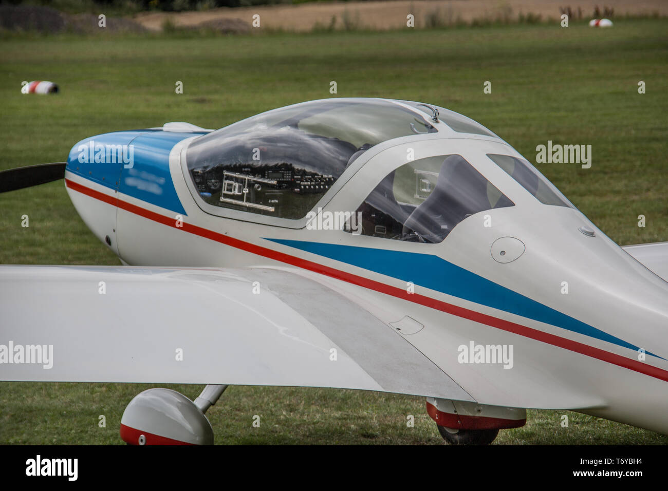 Propeller airplane cockpit with instrument panel Stock Photo - Alamy