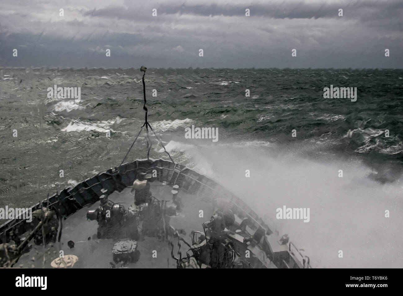 NATO military ship at sea during a storm Stock Photo - Alamy