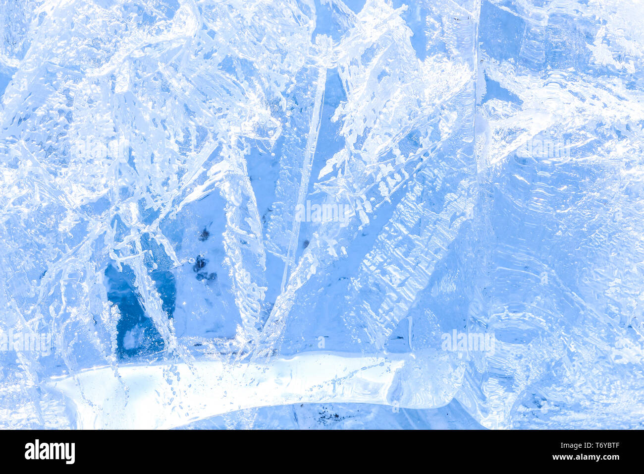 Full frame ice background. Backlit with the sun Stock Photo - Alamy