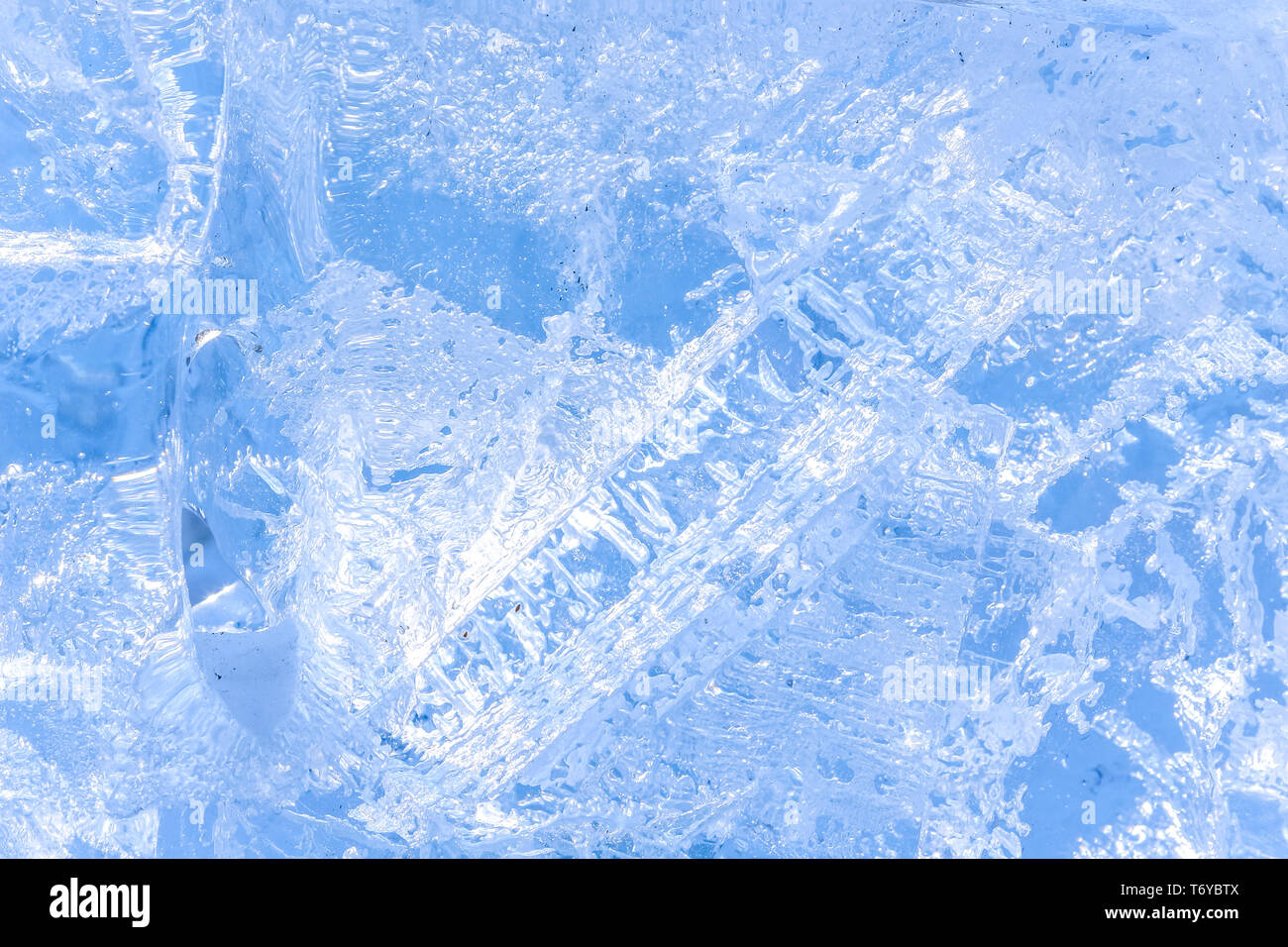 Full frame ice background. Backlit with the sun Stock Photo - Alamy