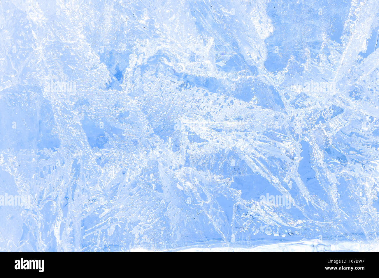 Full frame ice background. Backlit with the sun Stock Photo - Alamy