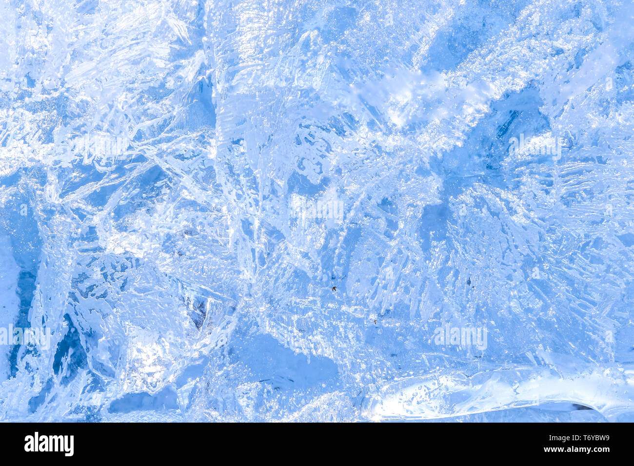 Full frame ice background. Backlit with the sun Stock Photo - Alamy