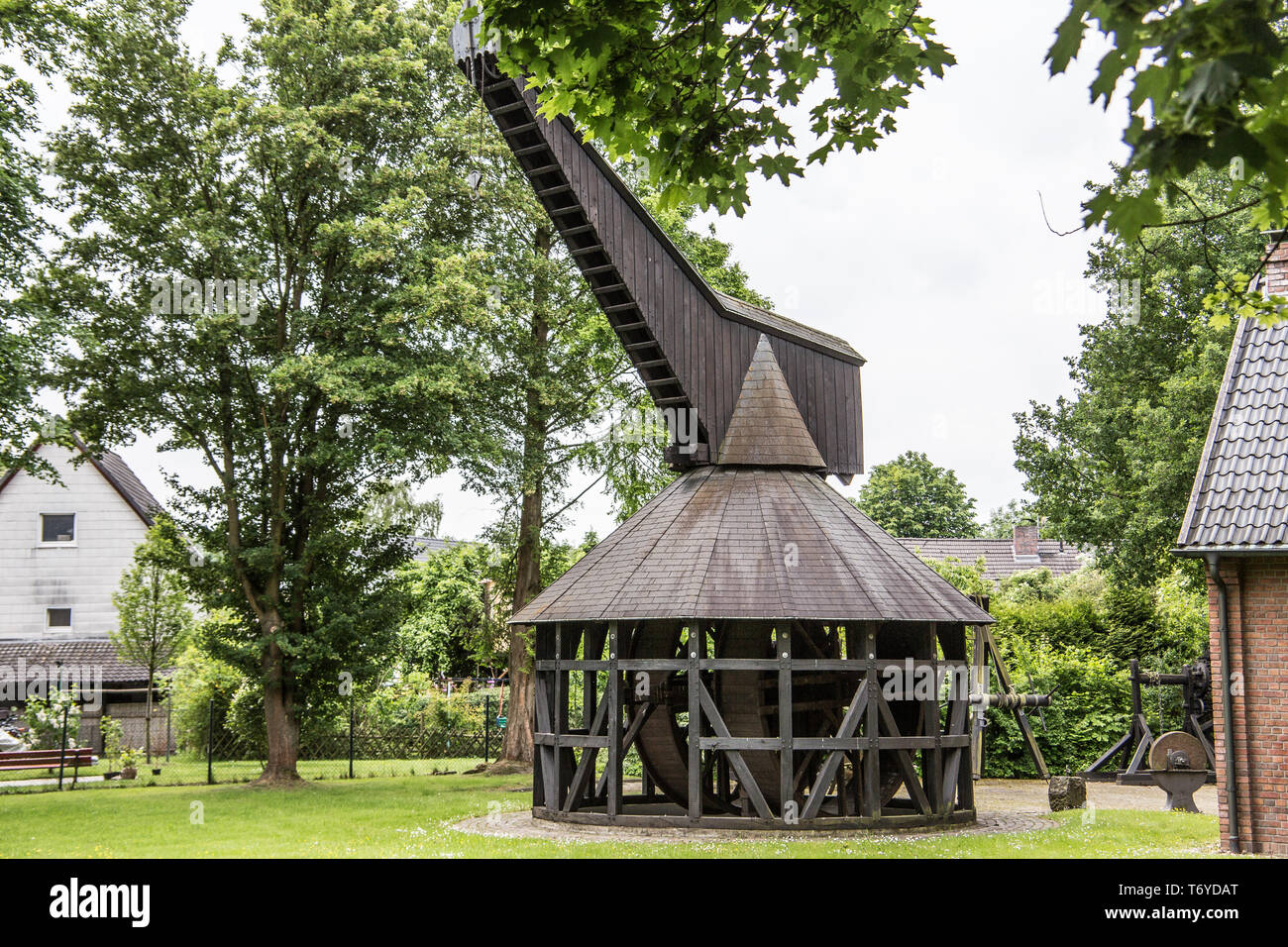 Crane lifting house hi-res stock photography and images - Alamy