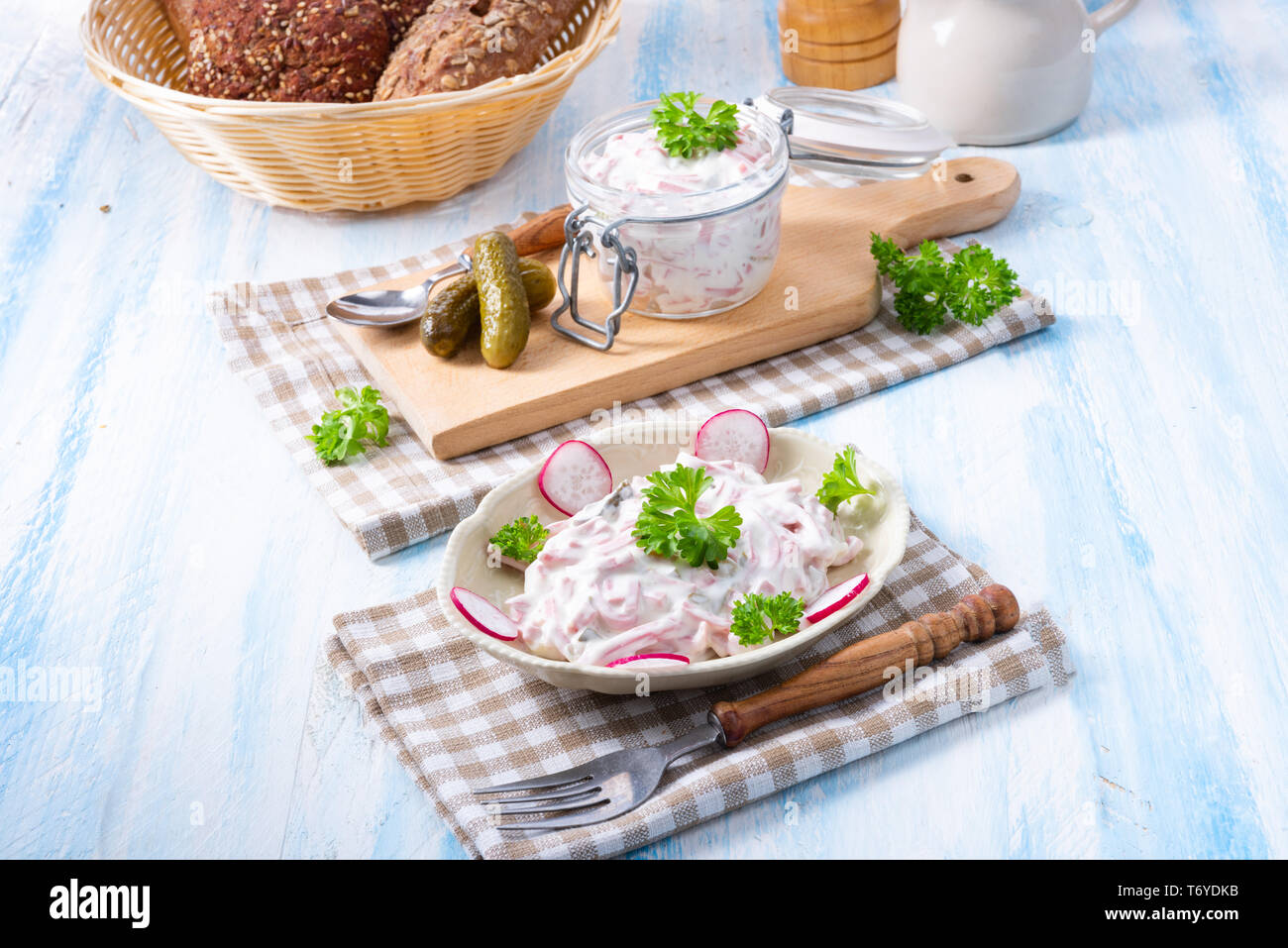 delicious homemade meat salad with mayonnaise and cucumber Stock Photo ...
