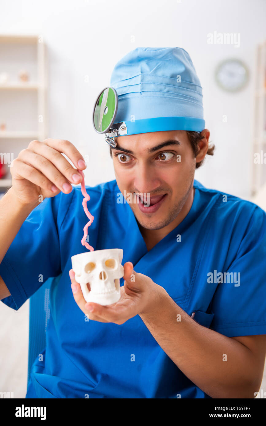 Mad doctor working in the clinic Stock Photo - Alamy