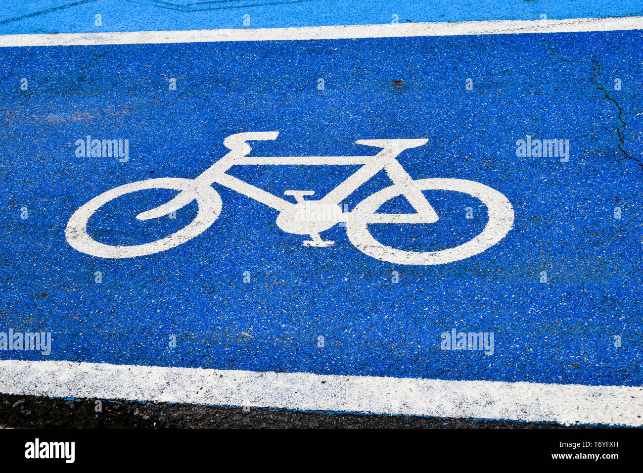 Bicycle lane sign on the bicycle way with blue colored asphalt Stock ...