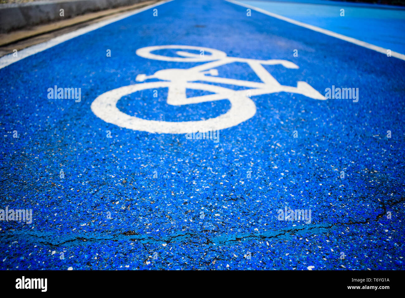 Bicycle lane sign on the bicycle way with blue colored asphalt Stock ...