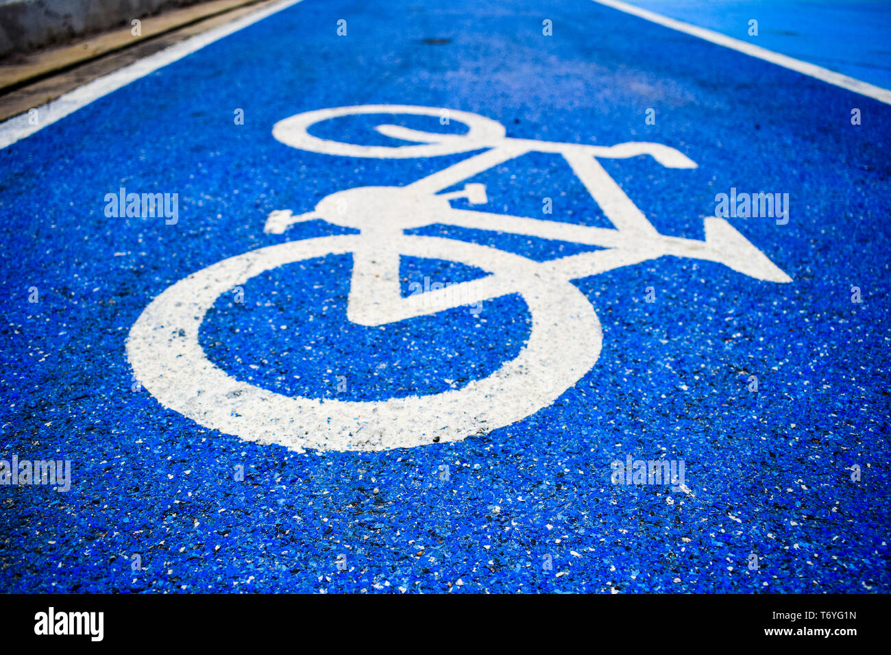 Bicycle lane sign on the bicycle way with blue colored asphalt Stock ...
