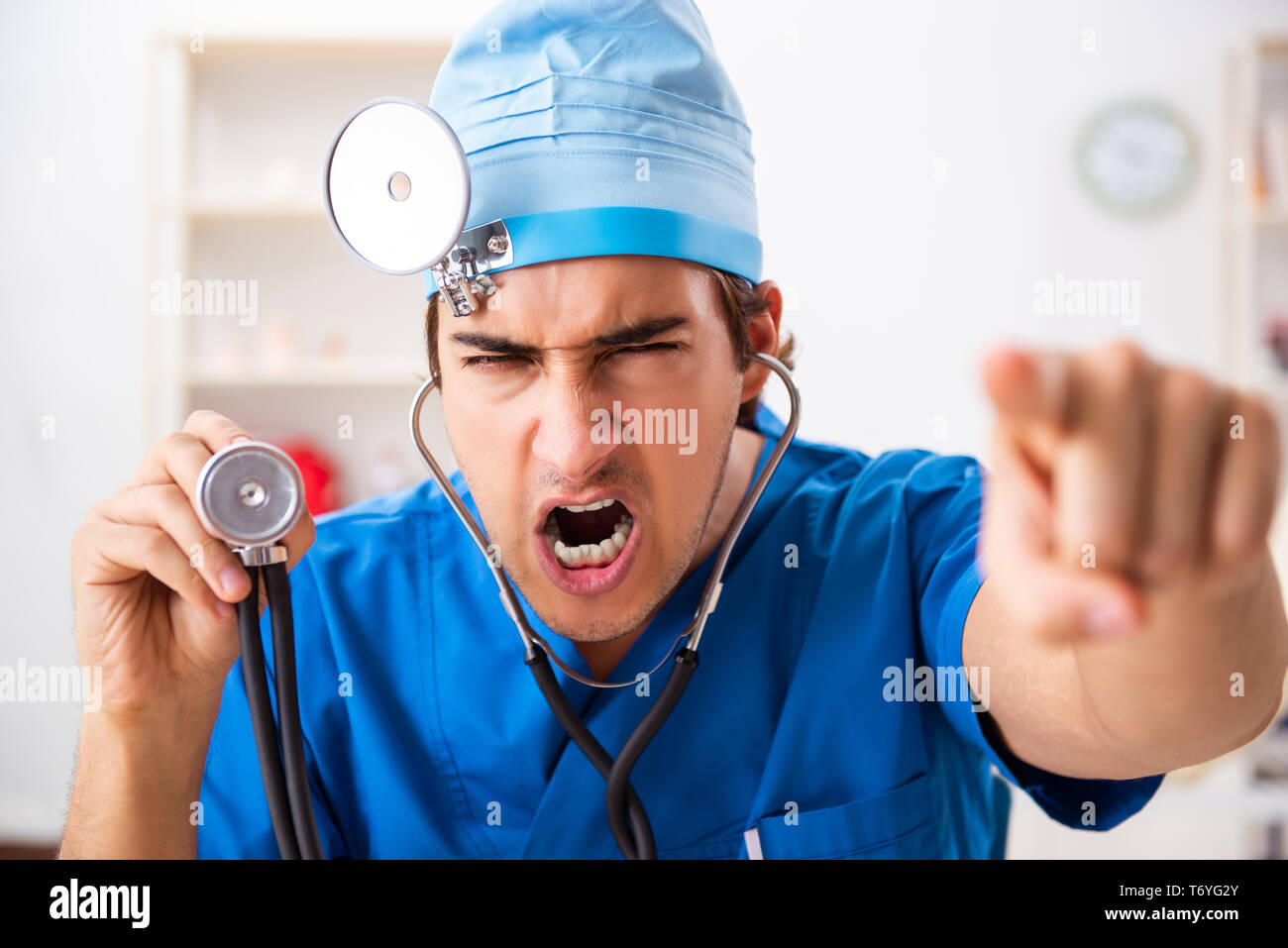 Angry pointing doctor hi-res stock photography and images - Alamy