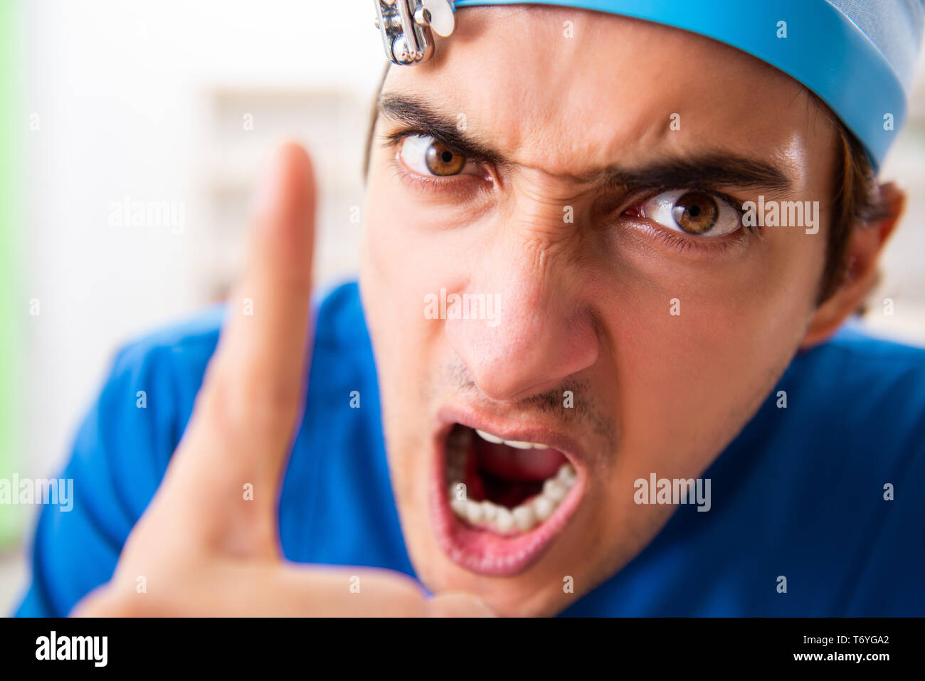 Angry doctor crazy shouting hi-res stock photography and images - Alamy