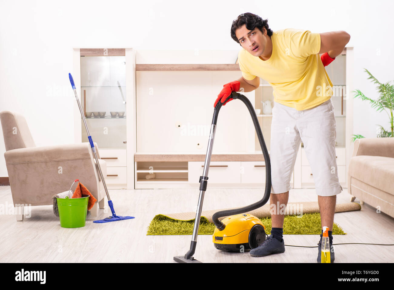 Man doing housework hi-res stock photography and images - Alamy