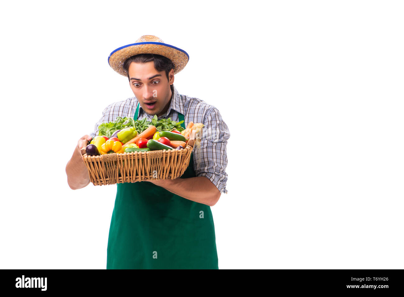 Young farmer with fresh produce isolated on white background Stock ...