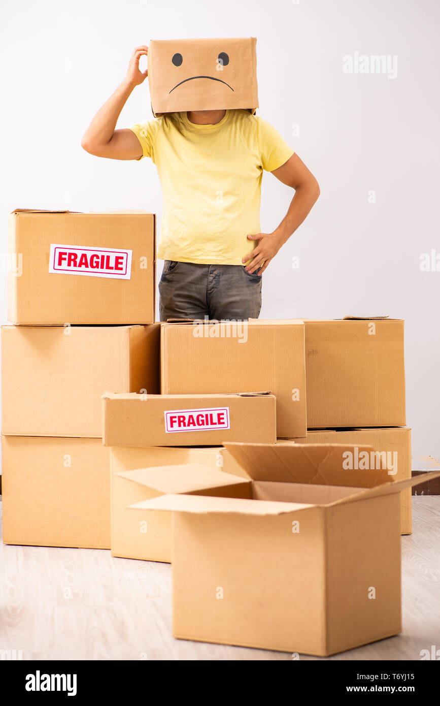Unhappy packing boxes hi-res stock photography and images - Alamy