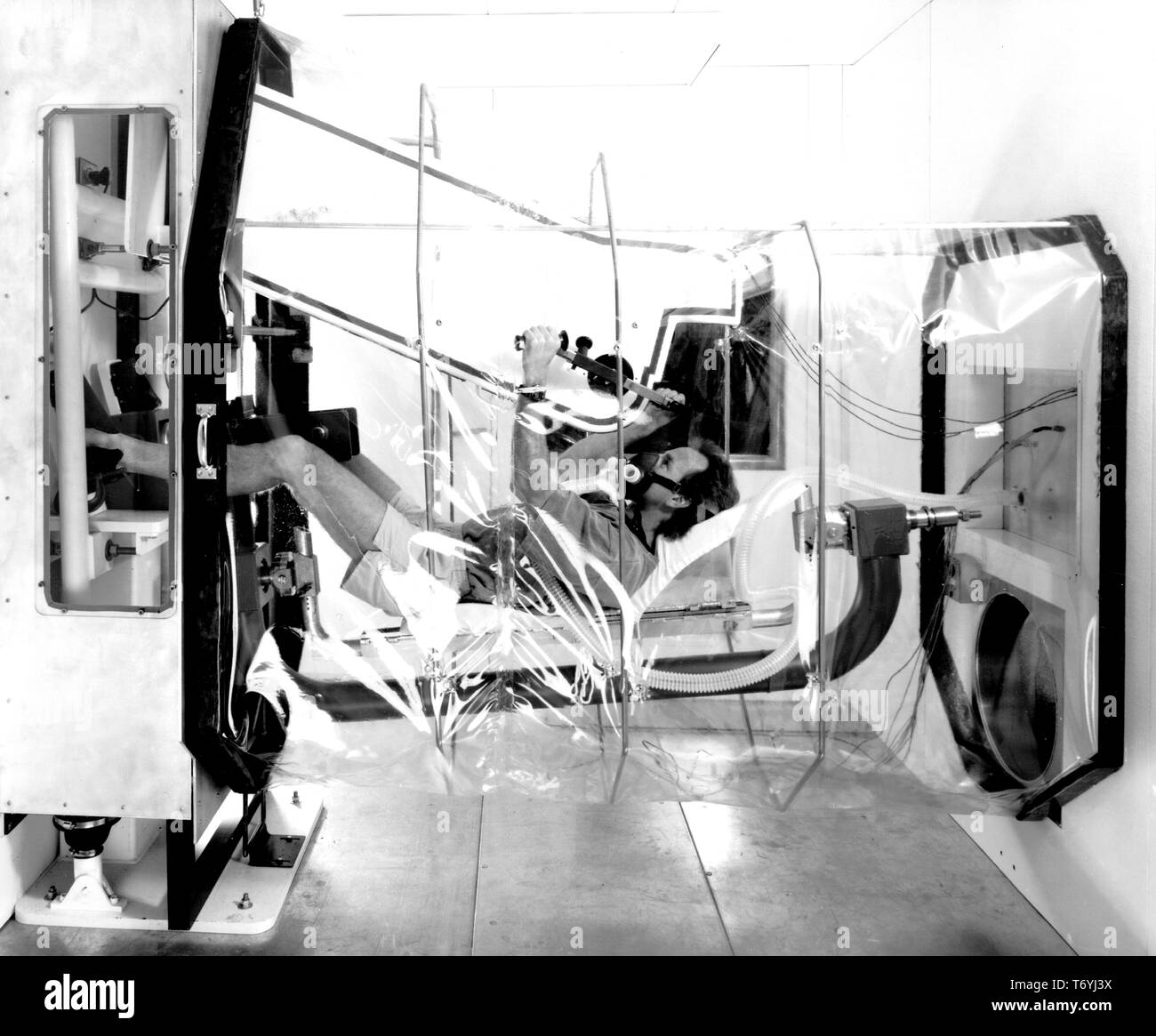 Photograph of the NASA astronaut using the Extra-Vehicular Activity ...