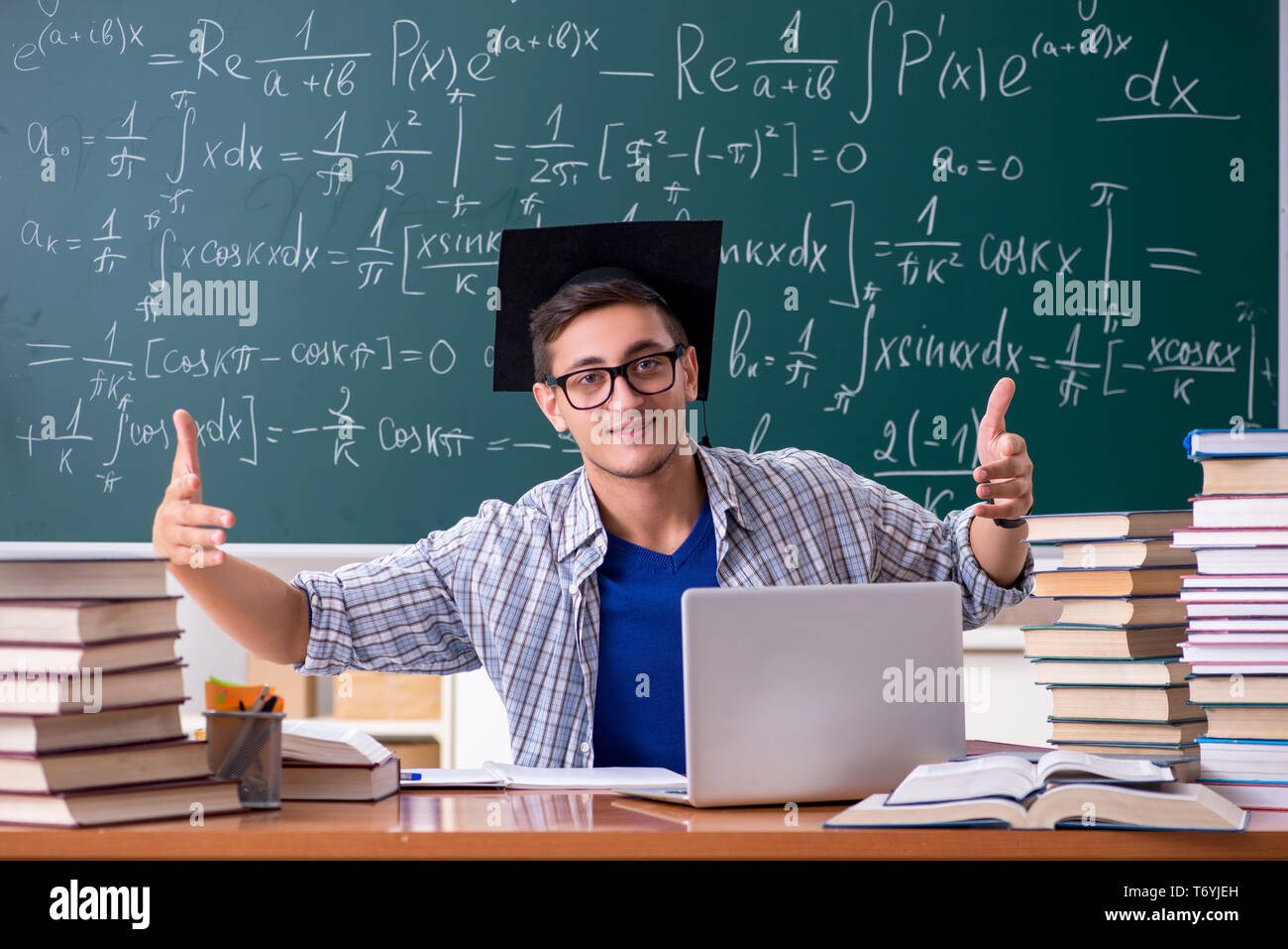 School teacher mortar board classroom hi-res stock photography and ...