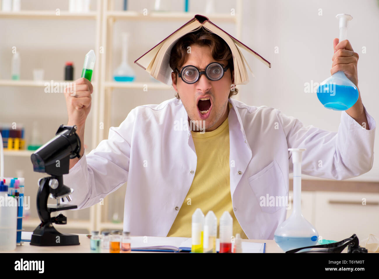 Examining experiments hi-res stock photography and images - Alamy