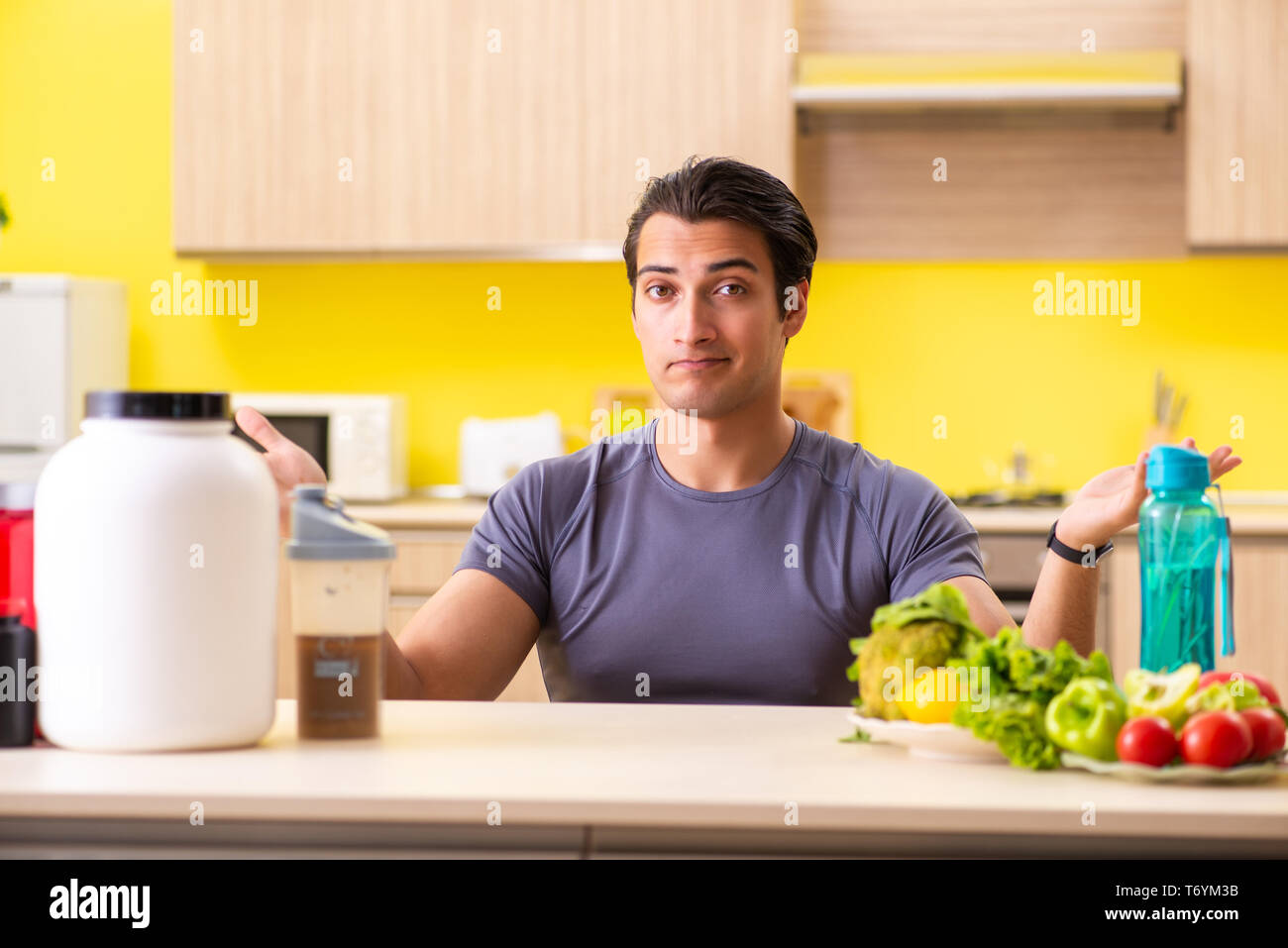 Muscle man eating protein hi-res stock photography and images - Alamy