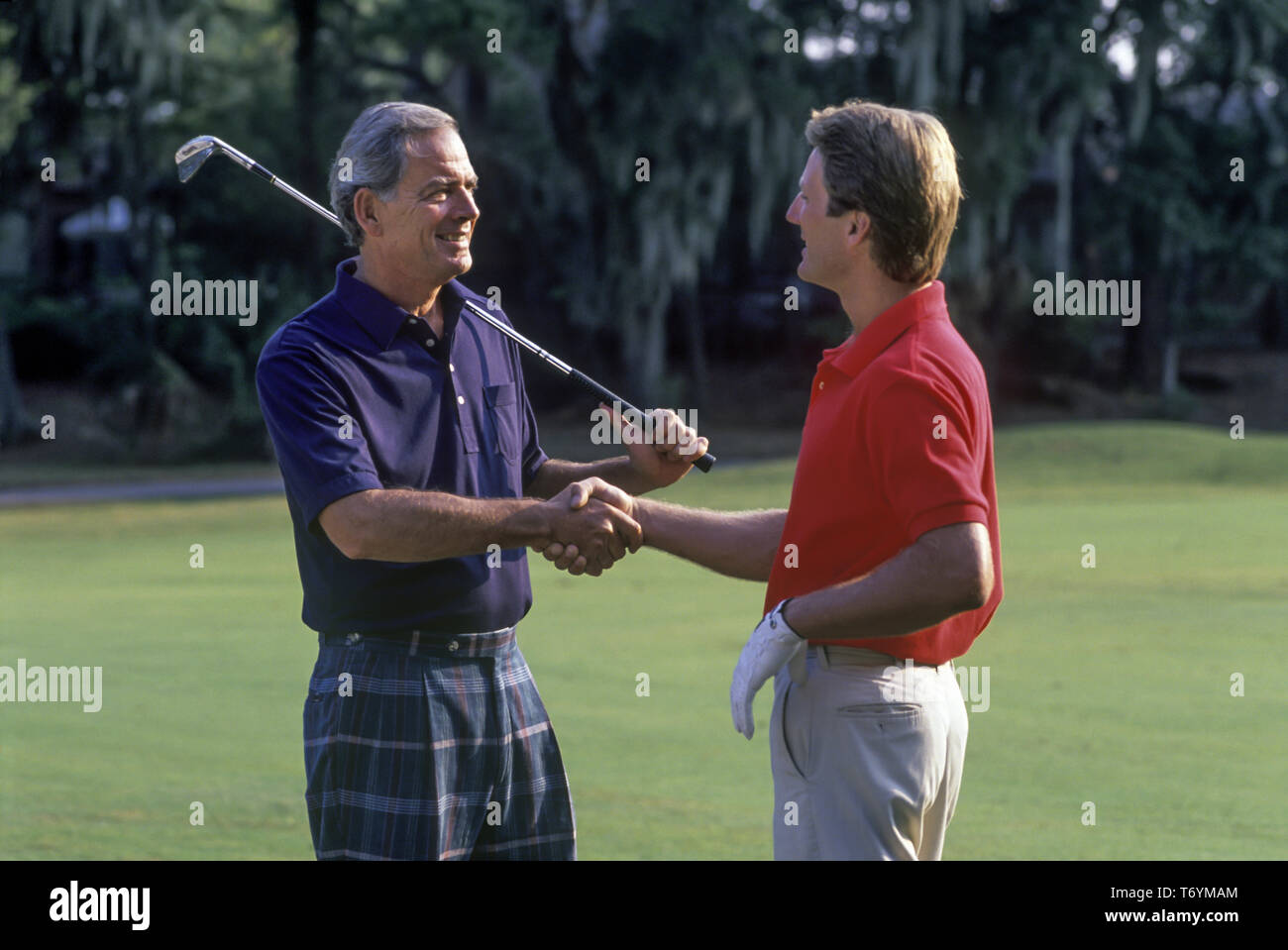 Golf handshake hi-res stock photography and images - Alamy