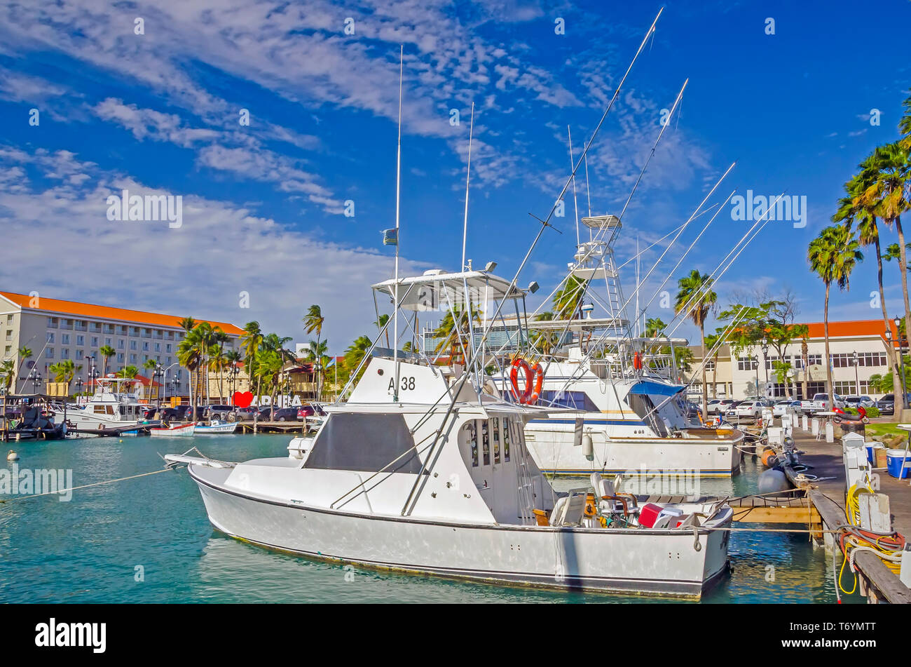 Renaissance Marina Oranjestad Aruba with fleet of fishing boats next to ...