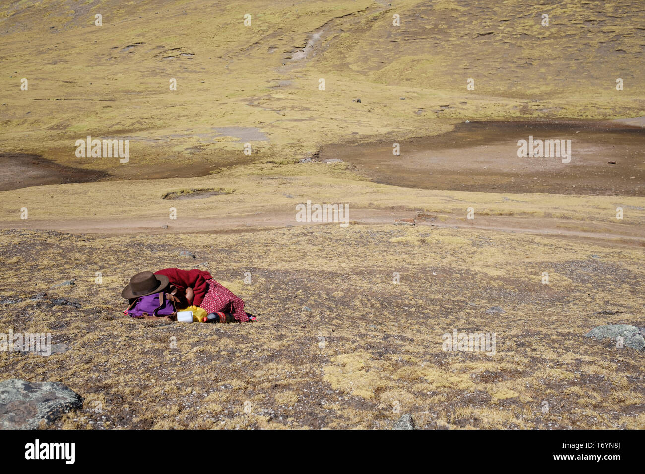 Local Peruvian woman sleeping on the ground seen on our way up to the ...
